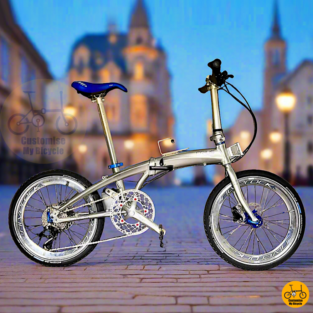 Crius Velocity 20-inch folding bike with a platinum silver frame and ...